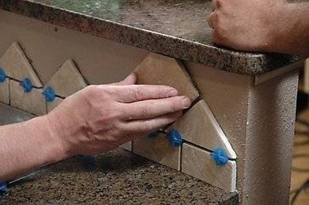 How To Install A Travertine Tile Backsplash Hunker how-to-install-a-travertine-tile-backsplash-hunker